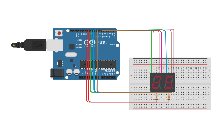 Circuit design Numeros random con dos visualizadores | Tinkercad