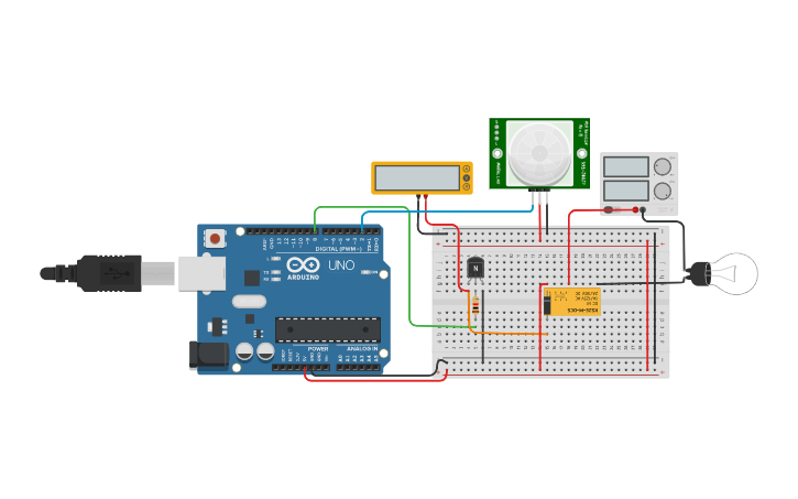 Circuit design lampada relè | Tinkercad