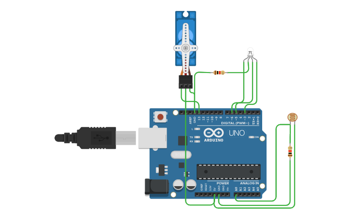 Circuit design PRAKTIKUM 7 - SENSOR CAHAYA (PHOTORESISTOR) - Tinkercad