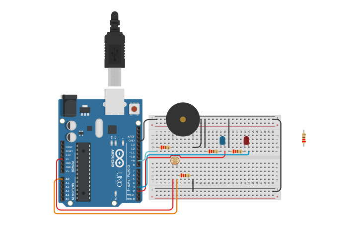 Circuit design LDR AND BUZZER | Tinkercad
