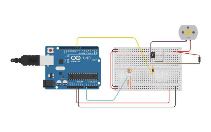 Circuit design DC motor control using photoresistor - Tinkercad