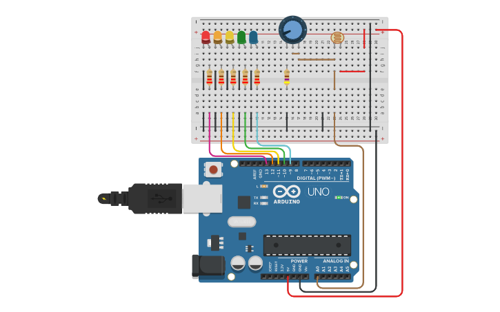 Circuit design LDR indicador LED debug | Tinkercad