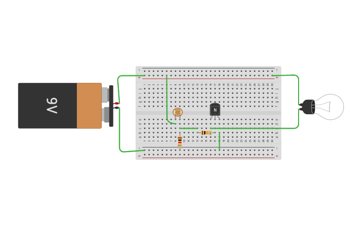 Circuit design transistor con ldr para regular intensidad en bombilla | Tinkercad