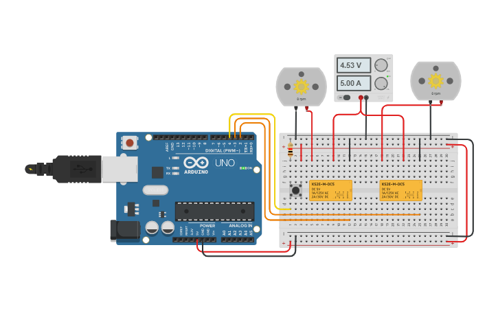 Circuit design Control de dos motores con un Boton CCA - Tinkercad
