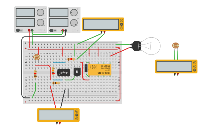 Circuit design Bulb control by light | Tinkercad