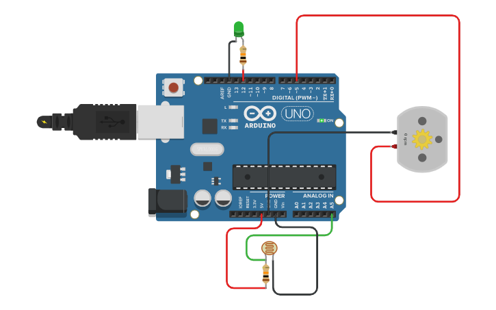 Circuit design PHOTORESISTOR CONTROLLED LED AND MOTOR - Tinkercad