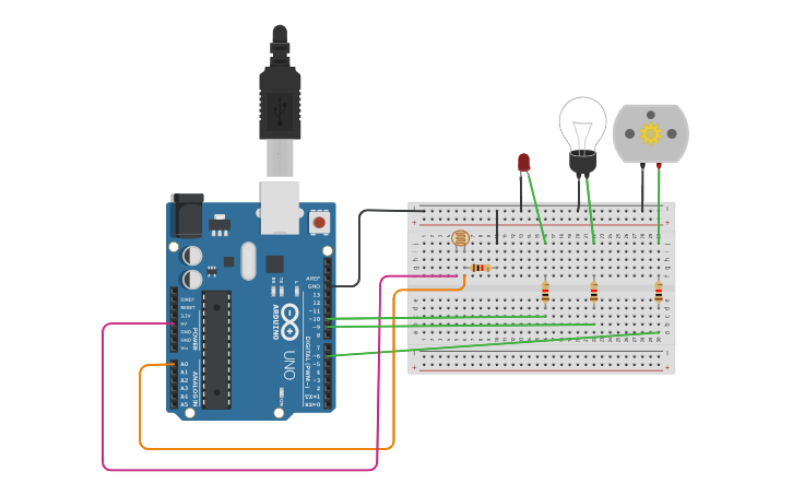 Circuit design Control a DC motor and bulb using LDR. | Tinkercad