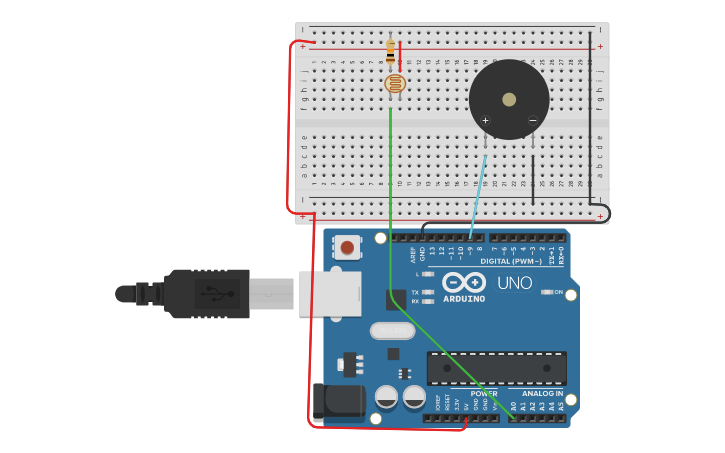 Circuit design Photoresistor + Piezo - Tinkercad