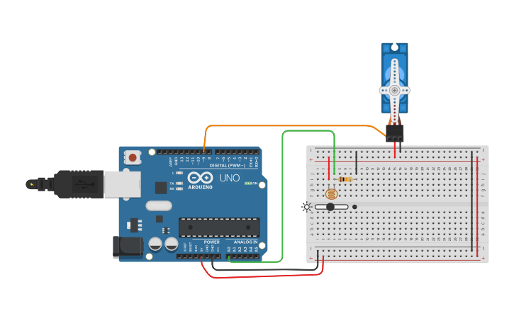 Circuit design dino jump with text based coding - Tinkercad