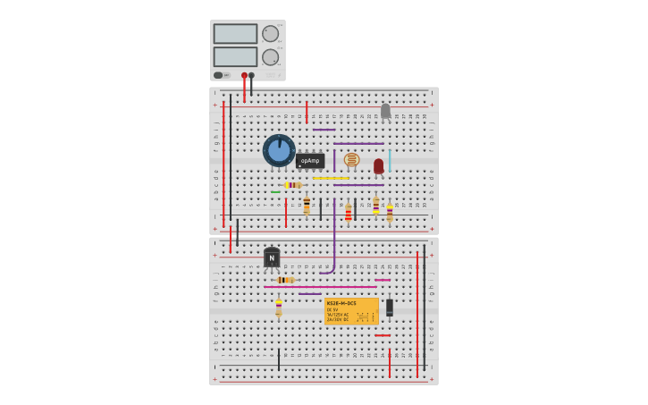 Circuit design relay ldr comparator | Tinkercad