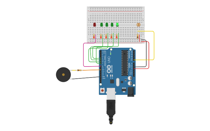 Circuit design piezo with photo resistor and leds - Tinkercad