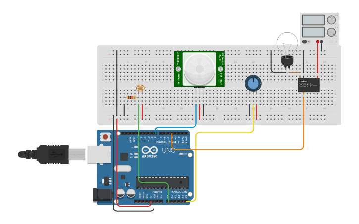 Circuit design Accensione lampada (relè, PIR, LDR) | Tinkercad