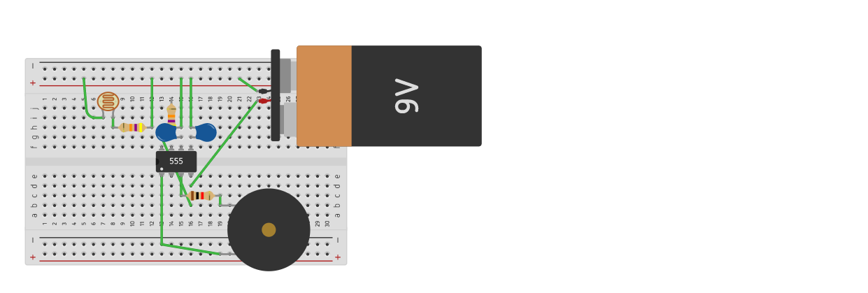 Circuit design DARKNESS DETECTOR USING 555IC TIMER - Tinkercad