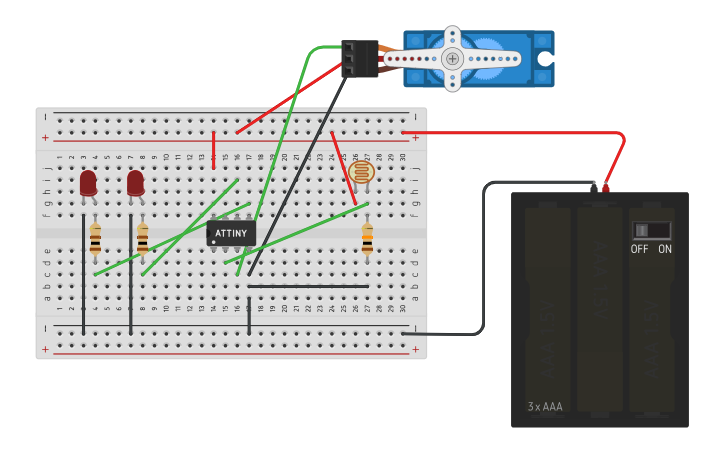 Circuit Design Attiny 2 Leds And Photocell Tinkercad