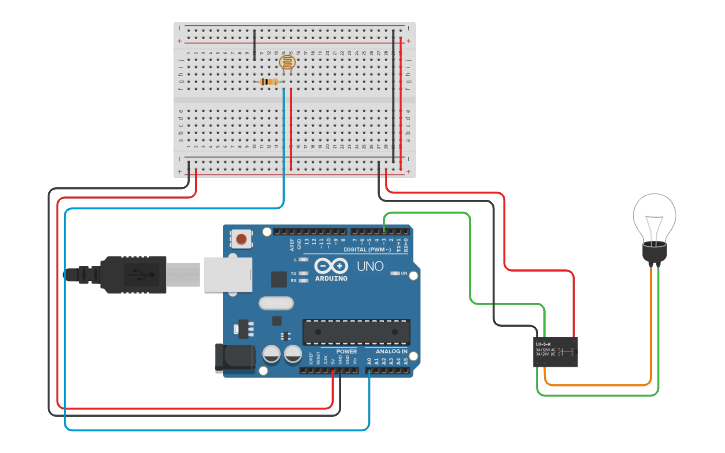 Circuit design sensor cahaya, relay dan lampu - Tinkercad