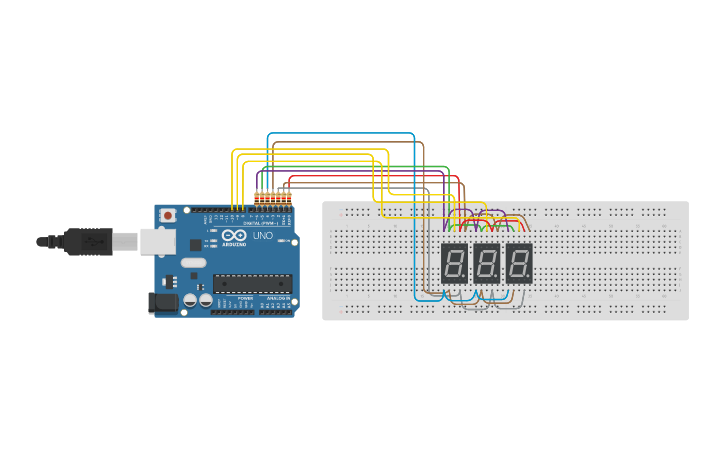 Circuit design 000-999 counter with 7-segment display | Tinkercad