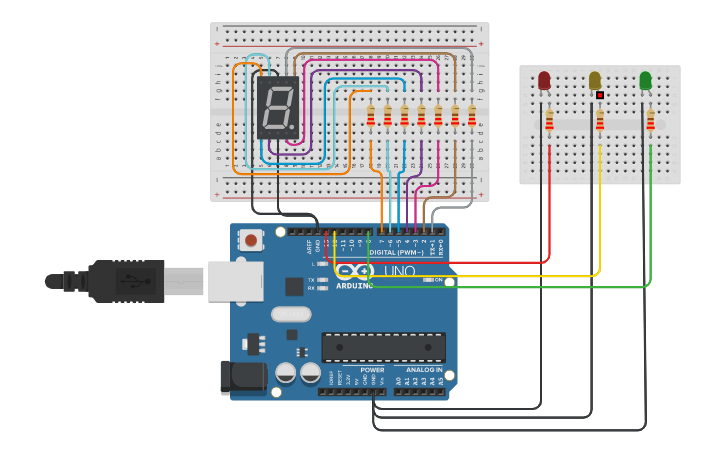 Circuit design Circuito display 7 segmenti + semaforo Mannis - Tinkercad