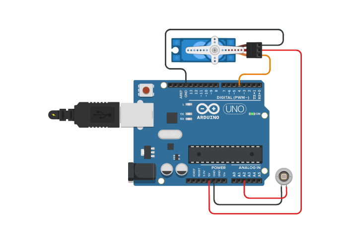 Circuit design ARDUINO SENSOR CAHAYA DAN MICRO SERVO | Tinkercad