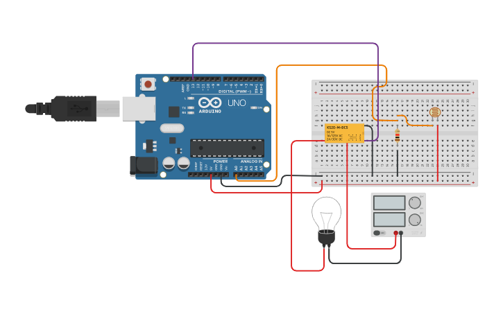 Circuit design Encendido de foco con fotorresistencia - Tinkercad