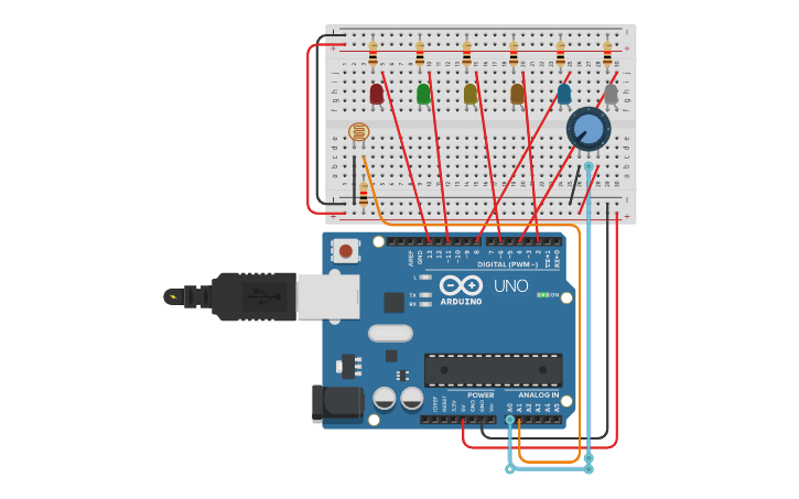 Circuit design Potentiometer_Photoresistor_Controlled_LEDs | Tinkercad