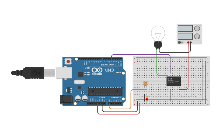 Circuit design RELAY+LDR - Tinkercad